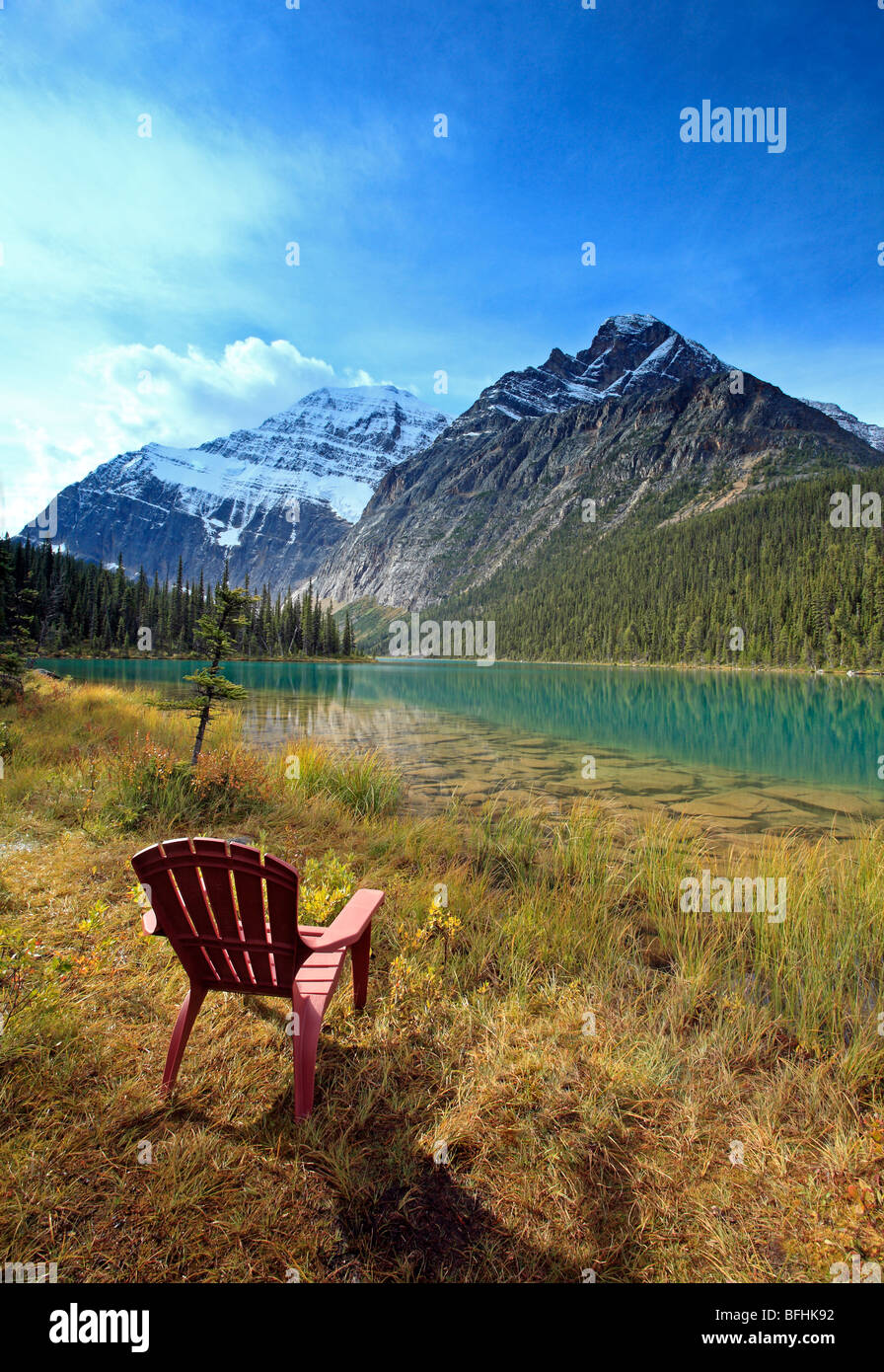 Deck chair overlooking Lake Cavell and Mount Edith Cavell Stock Photo ...