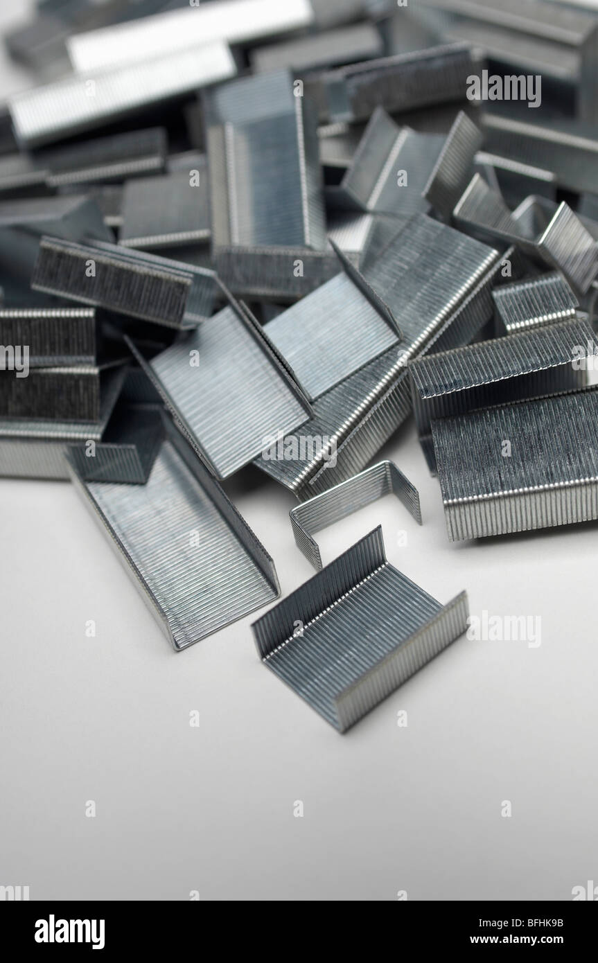 Heap of staples Stock Photo - Alamy