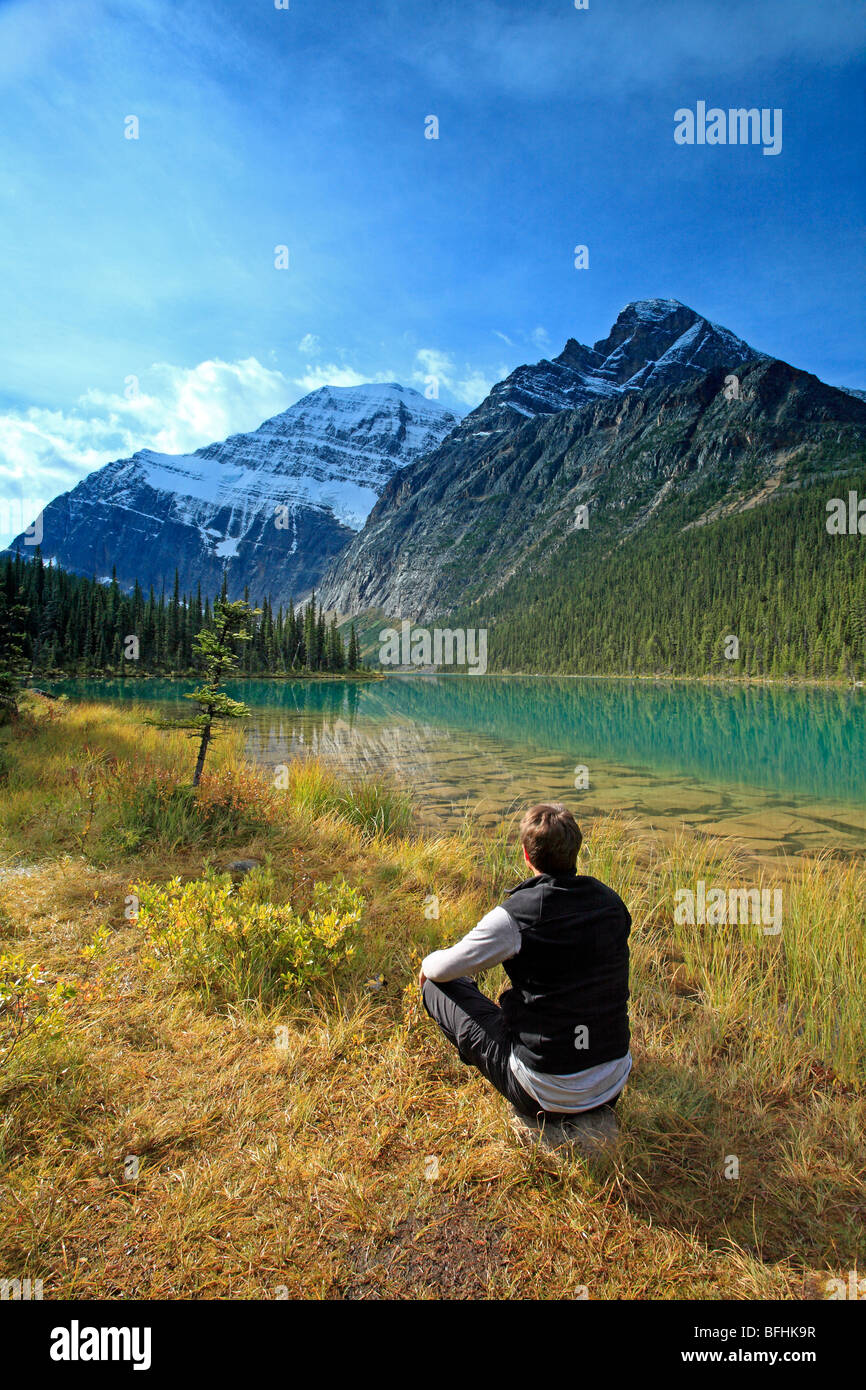 Deck chair overlooking Lake Cavell and Mount Edith Cavell Stock Photo ...