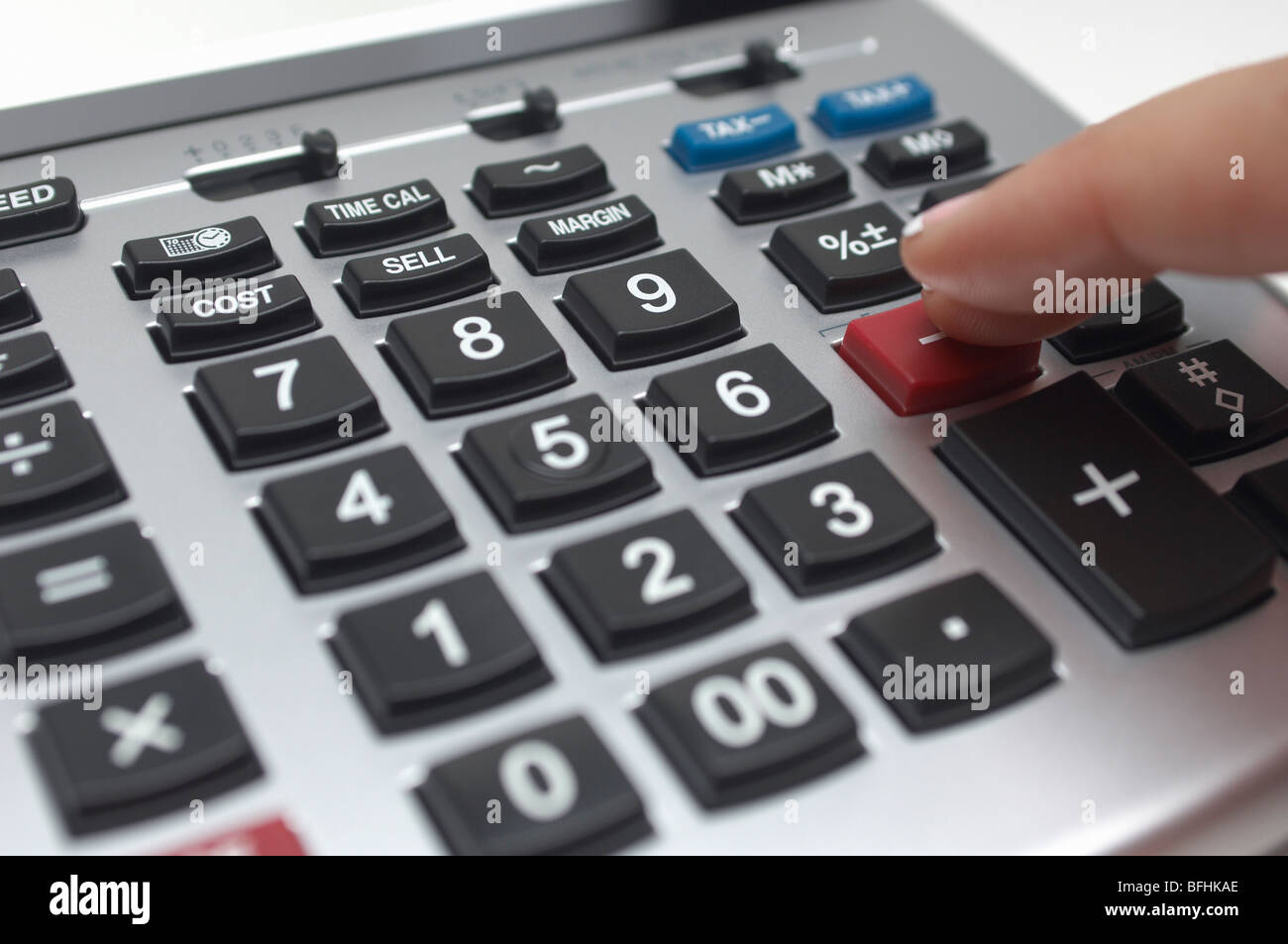 Calculator and finger pressing button hi-res stock photography and ...