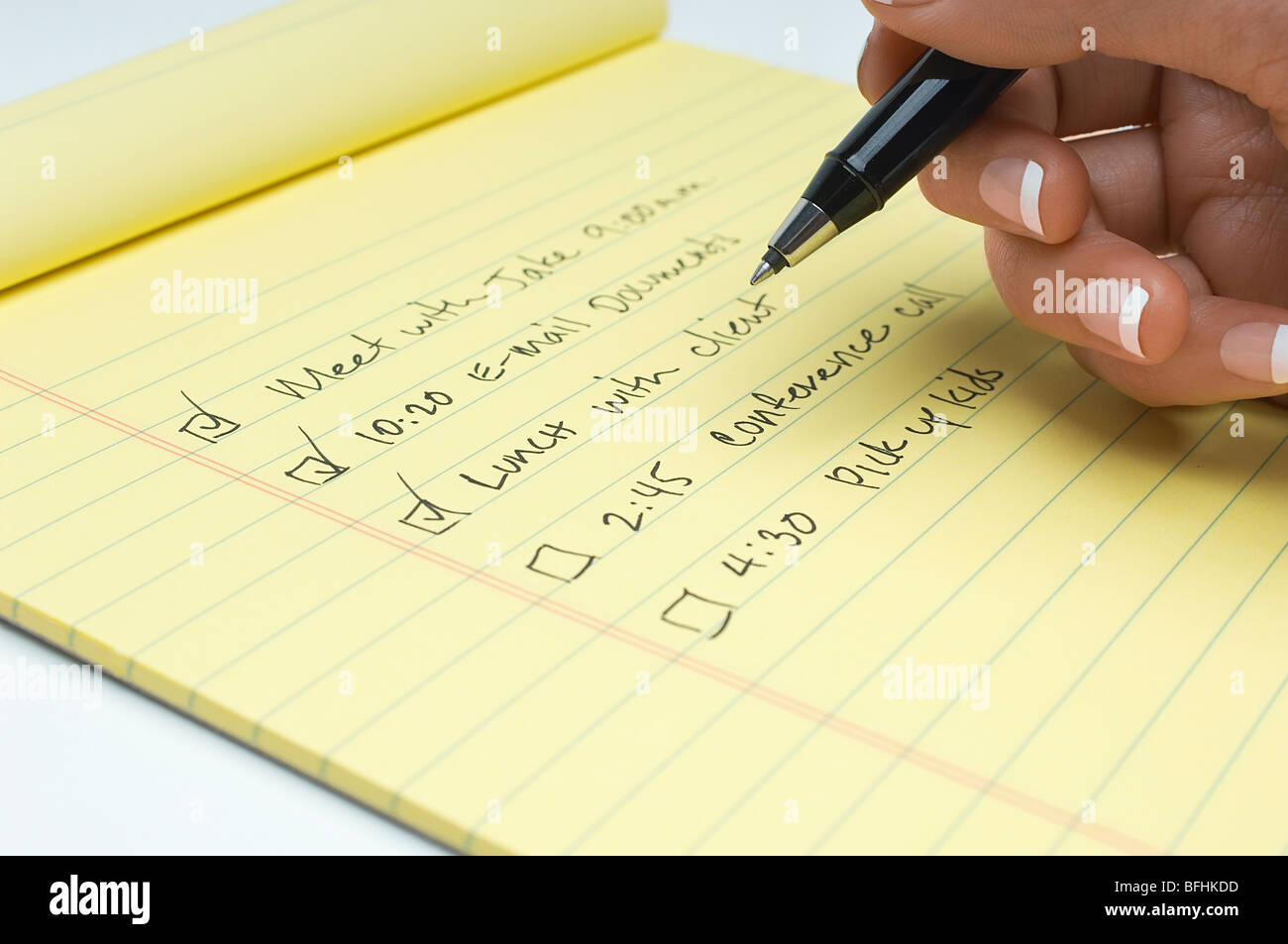 Woman writing list of tasks to do, close-up of hand Stock Photo - Alamy
