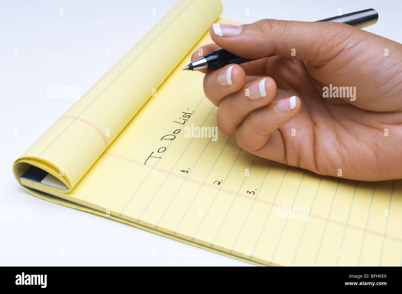 Woman writing list of tasks to do, close-up of hand Stock Photo - Alamy