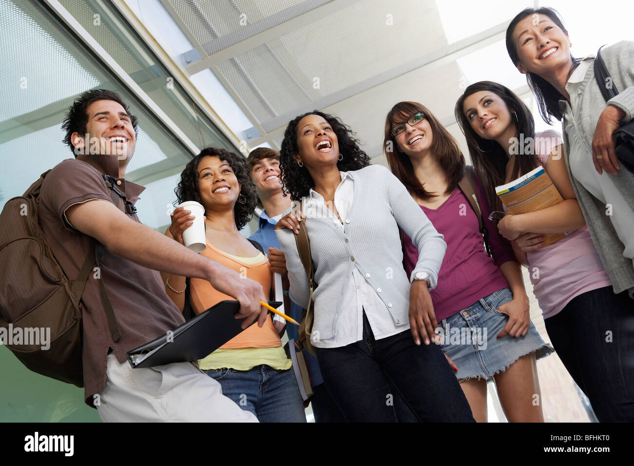 Students smiling in hallway at school, low angle view Stock Photo - Alamy