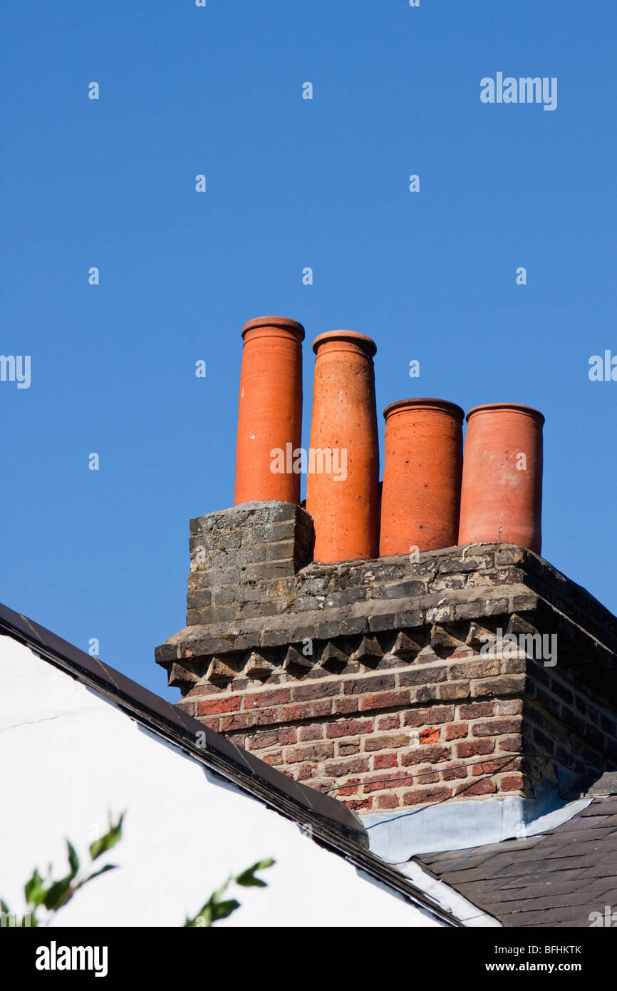 Four chimney pots hi-res stock photography and images - Alamy