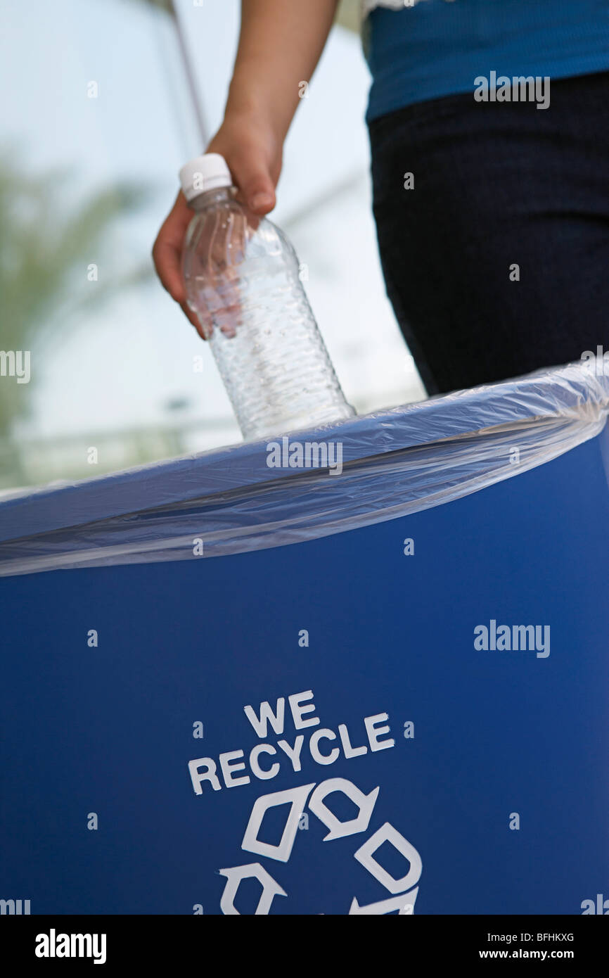 Person recycling plastic bottle, close-up Stock Photo - Alamy