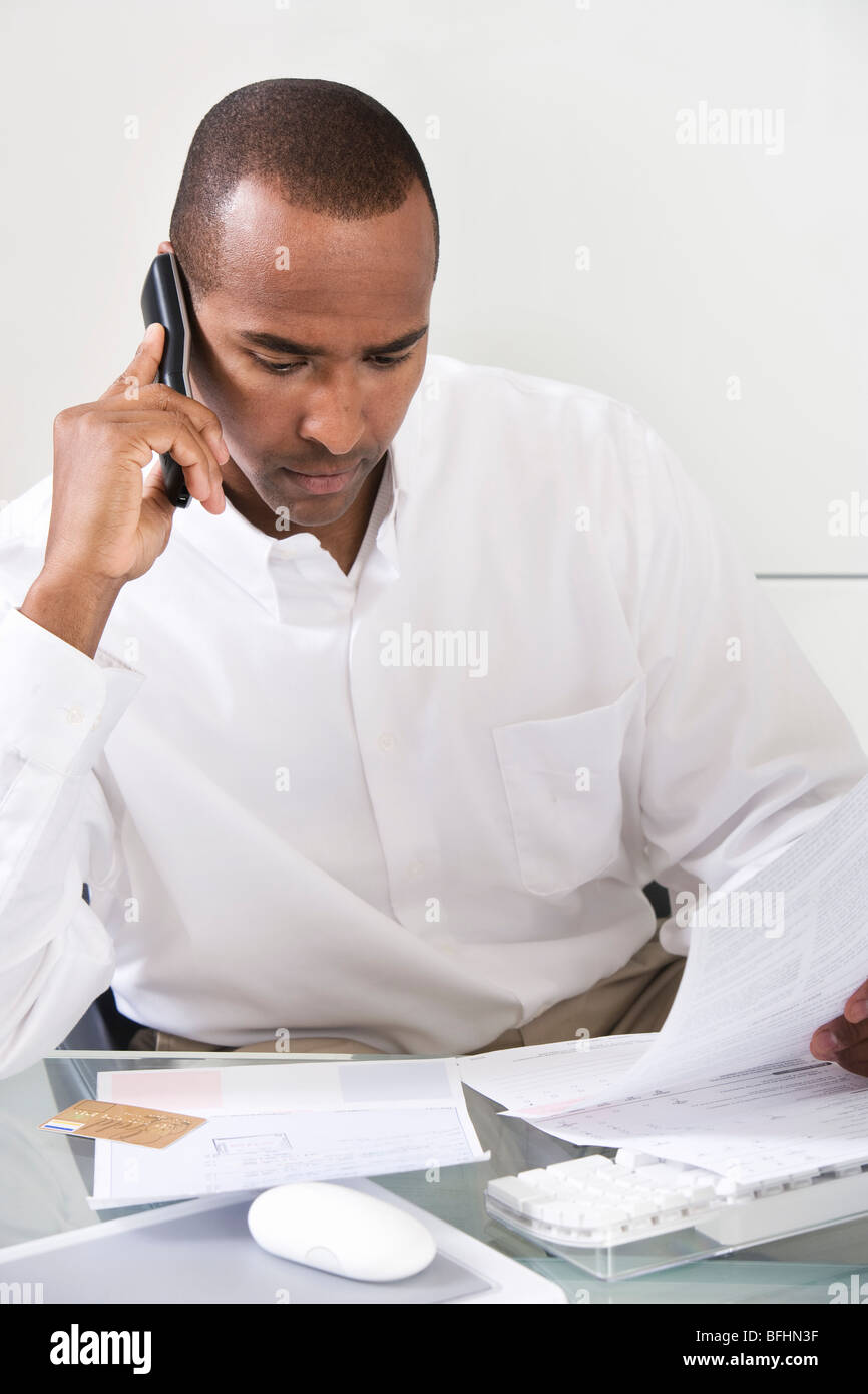 Man Paying Bills Stock Photo - Alamy
