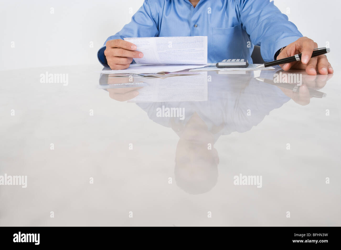 Man Figuring out Bills Stock Photo - Alamy