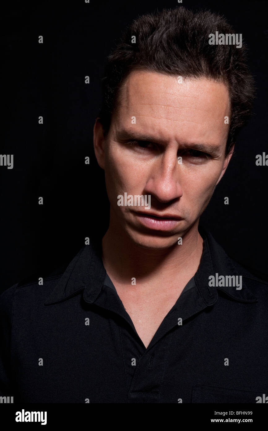 Expressive portrait of a young man Stock Photo - Alamy