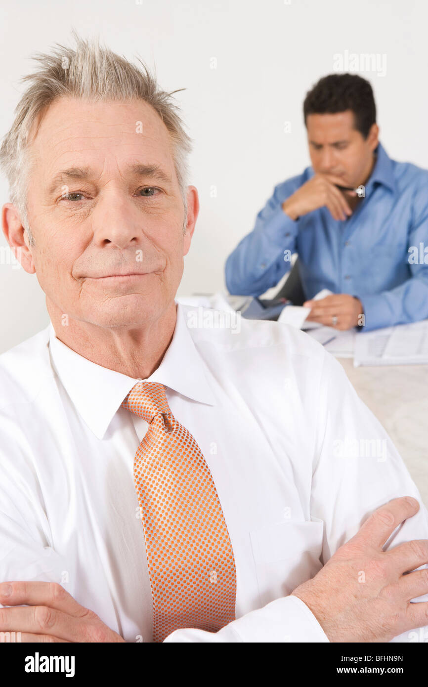 Businessmen Working in Office Stock Photo - Alamy