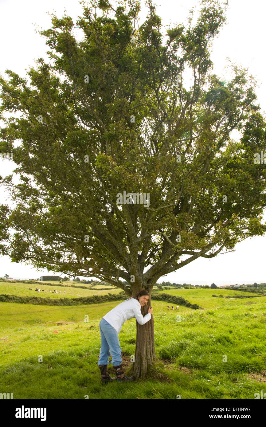 Girl hugging a fairy tree in County Wexford, Ireland Stock Photo - Alamy
