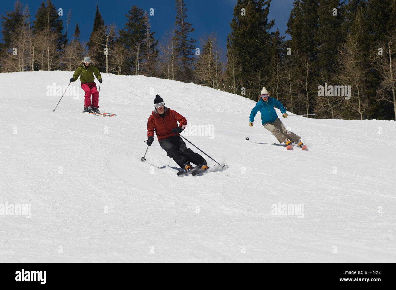 Women skiing down slope hi-res stock photography and images - Alamy