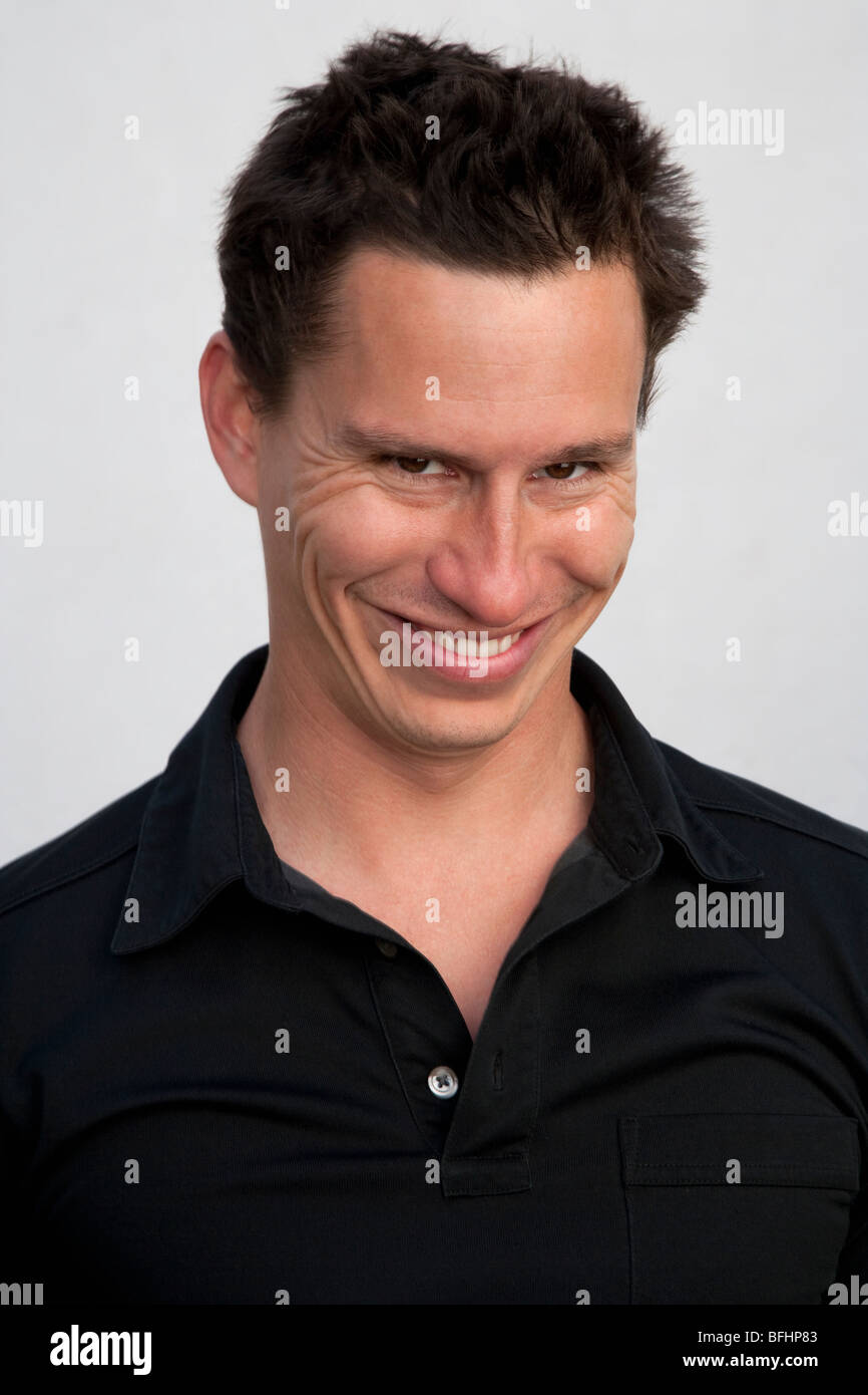 Expressive portrait of a young man Stock Photo - Alamy