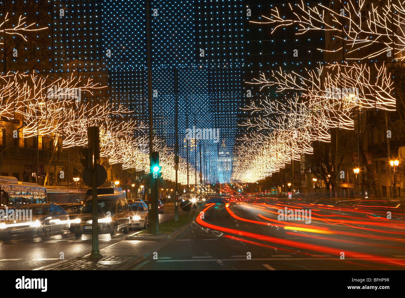 Traffic Light Trails on Decorated Street Stock Photo - Alamy