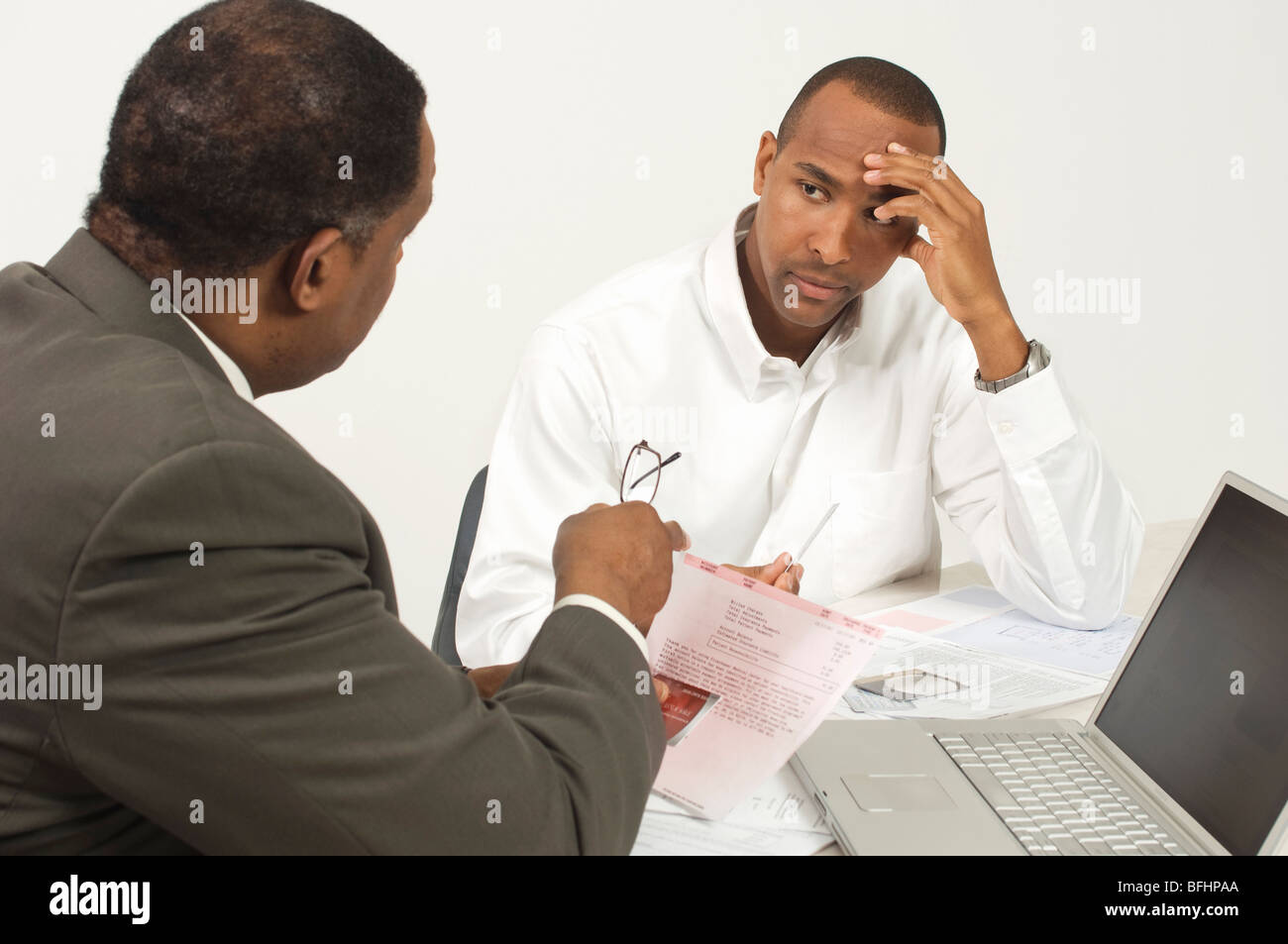 Accountant Talking to Client Stock Photo - Alamy