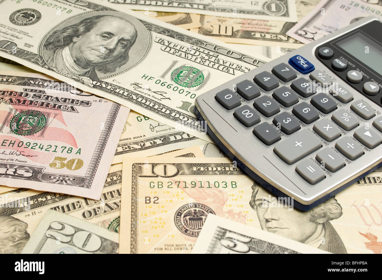 Money and Calculator Stock Photo - Alamy