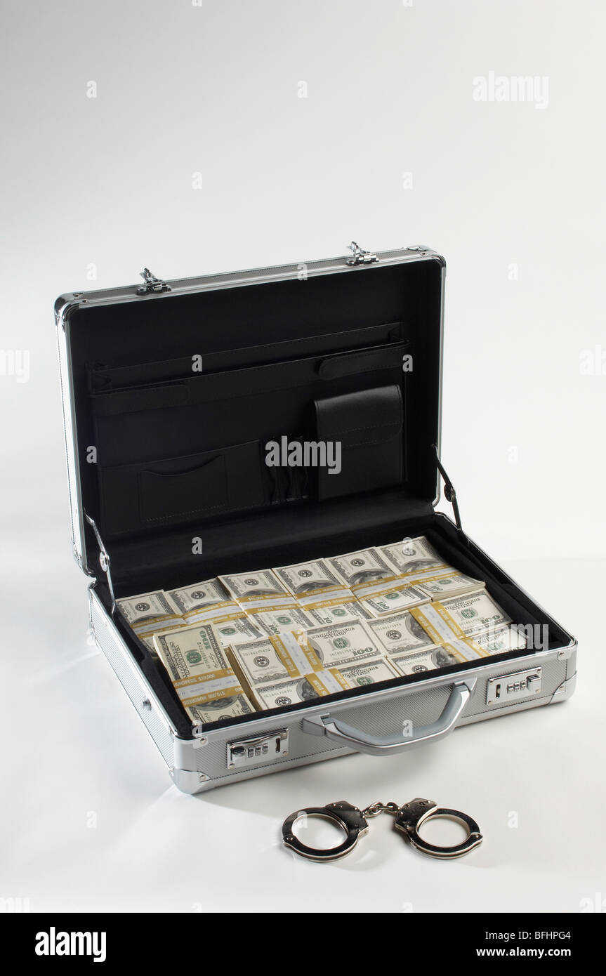 Handcuffs and briefcase hi-res stock photography and images - Alamy