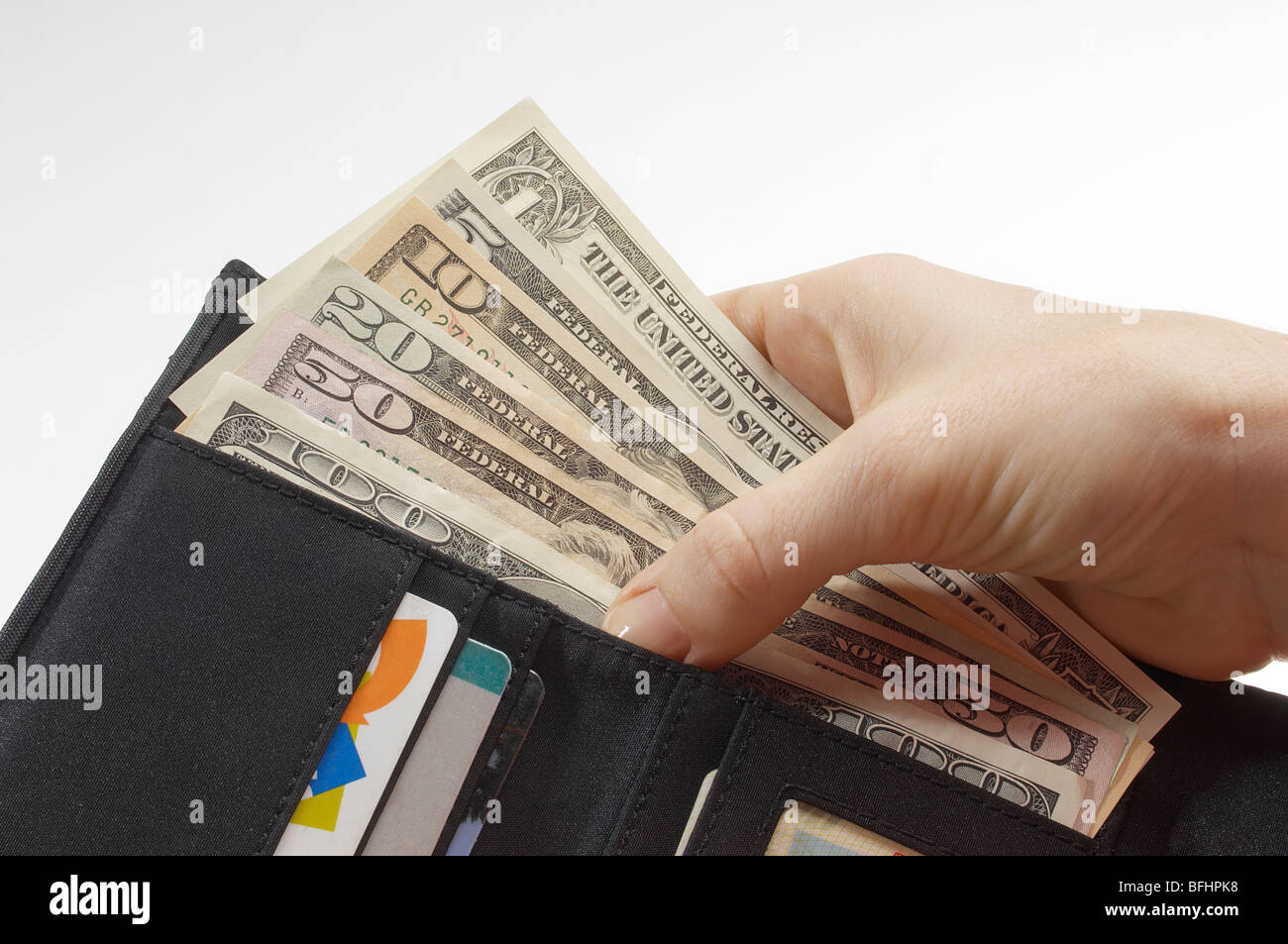 Wallet Full of Money Stock Photo - Alamy