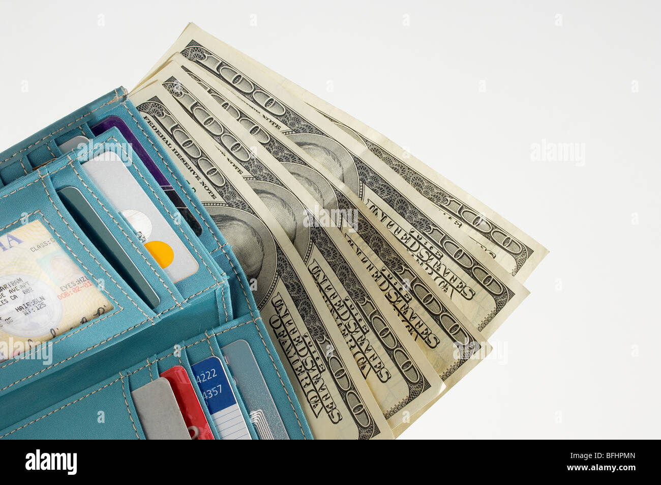 Wallet Full of Money Stock Photo - Alamy