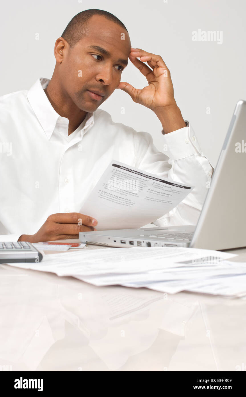 Man Doing Taxes Stock Photo - Alamy