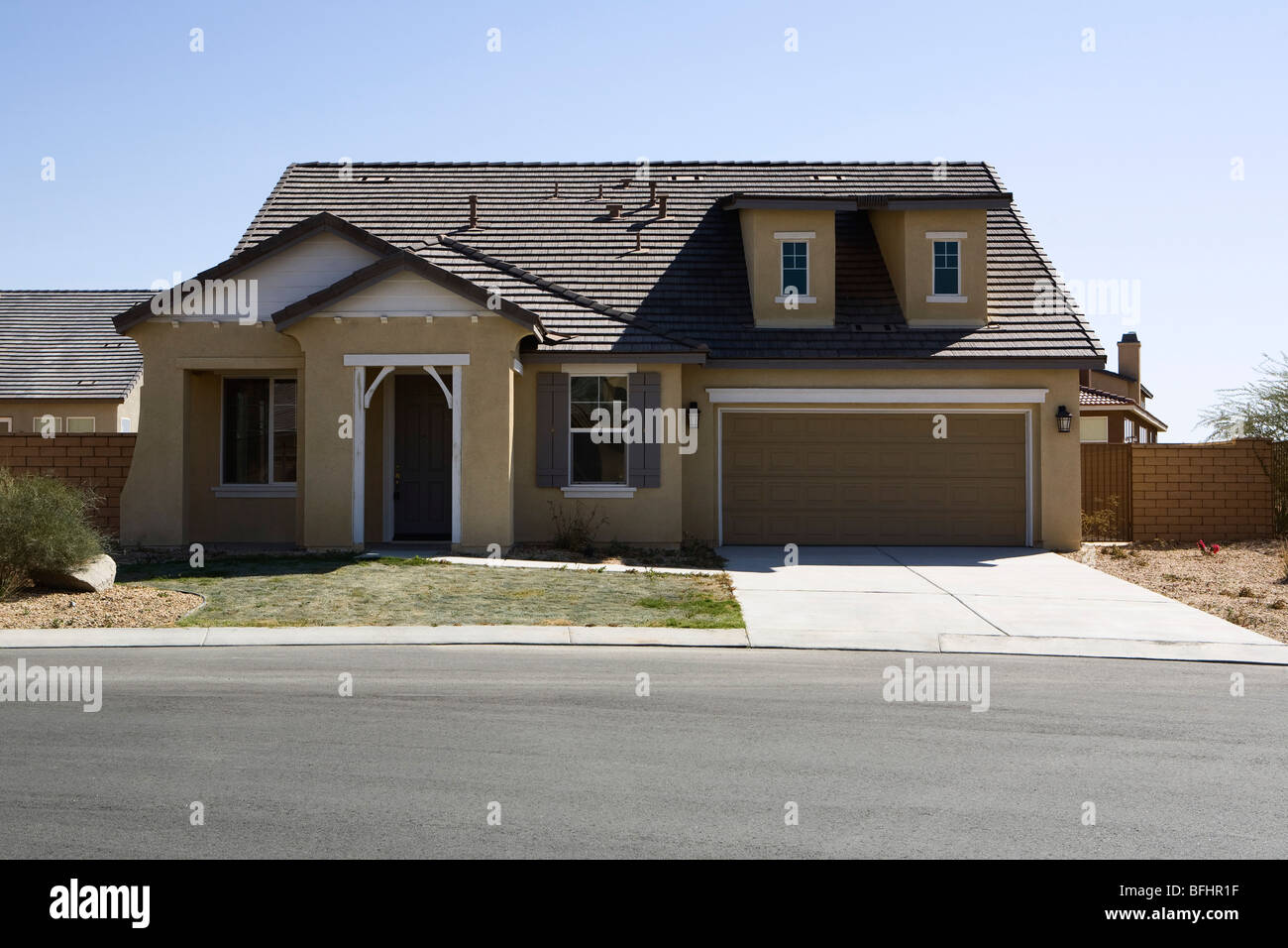 New House With Dormers Over Garage Stock Photo - Alamy