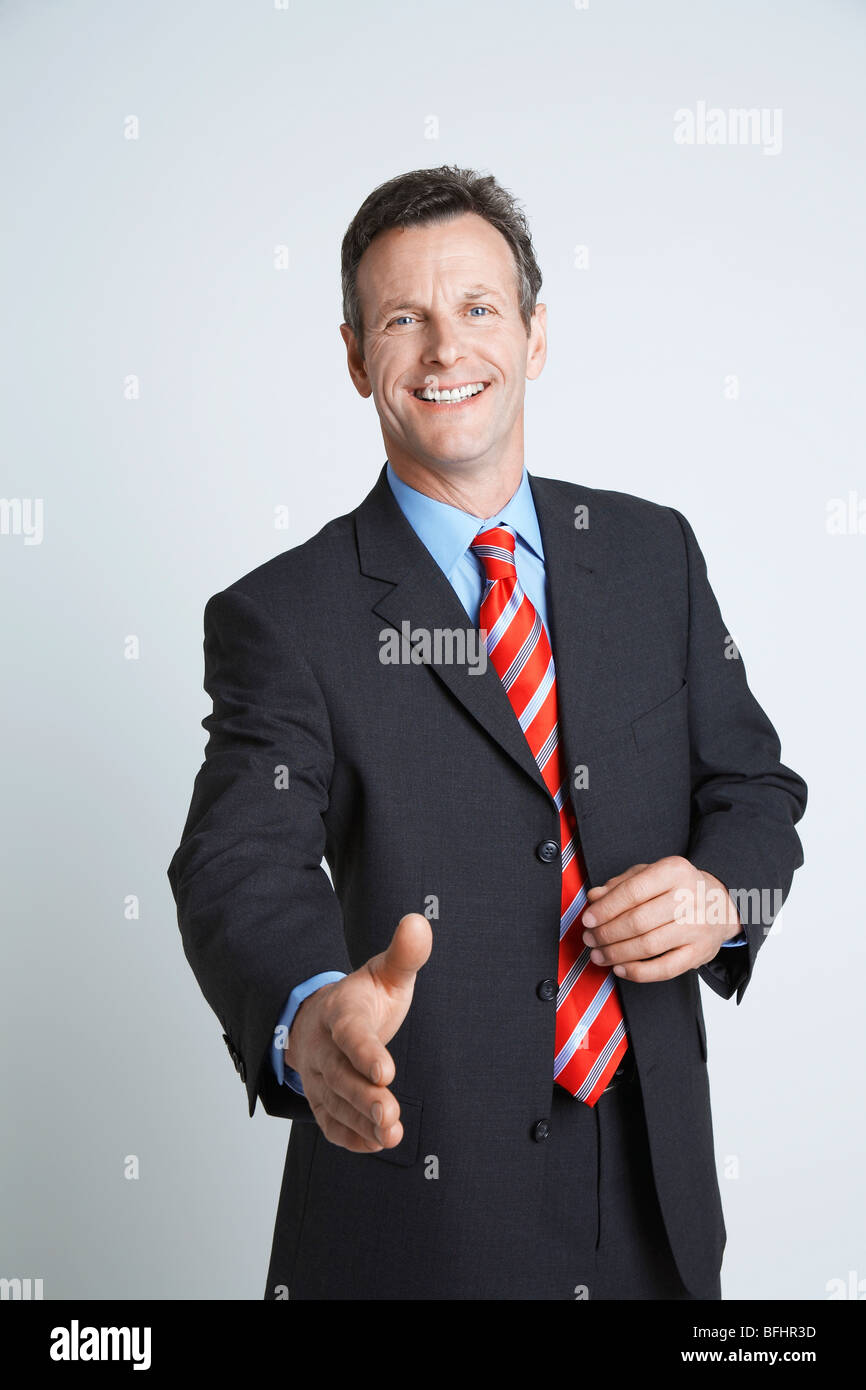 Businessman ready handshake standing hi-res stock photography and ...