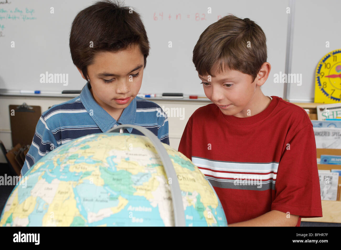 Two friends in classroom Stock Photo - Alamy