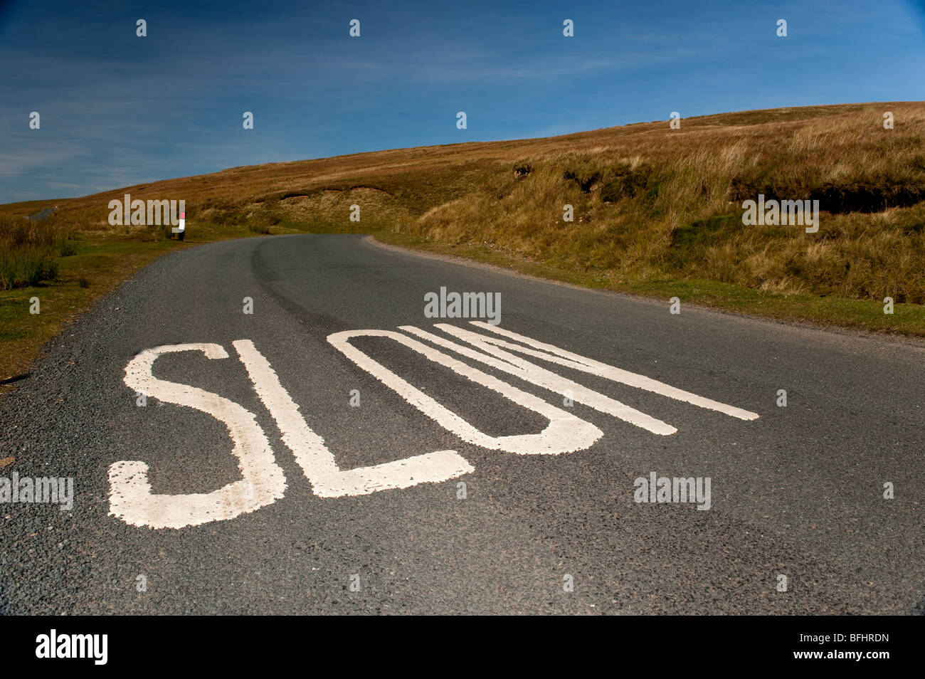 Slow road marking hi-res stock photography and images - Alamy