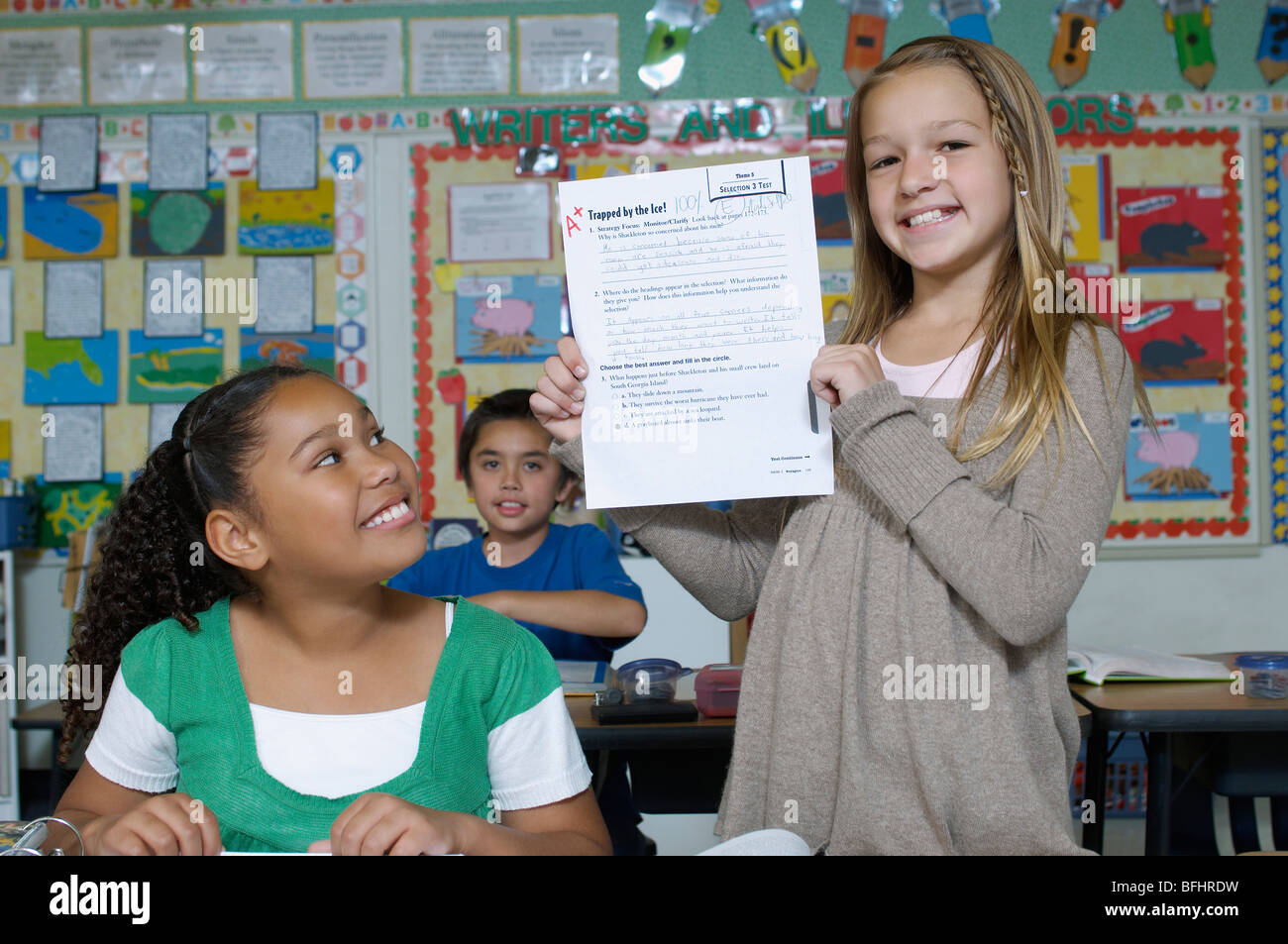 Girl presenting her test result Stock Photo - Alamy