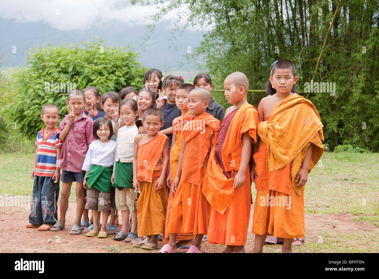 students from a small rural school in Myanmar pose for a class phot ...
