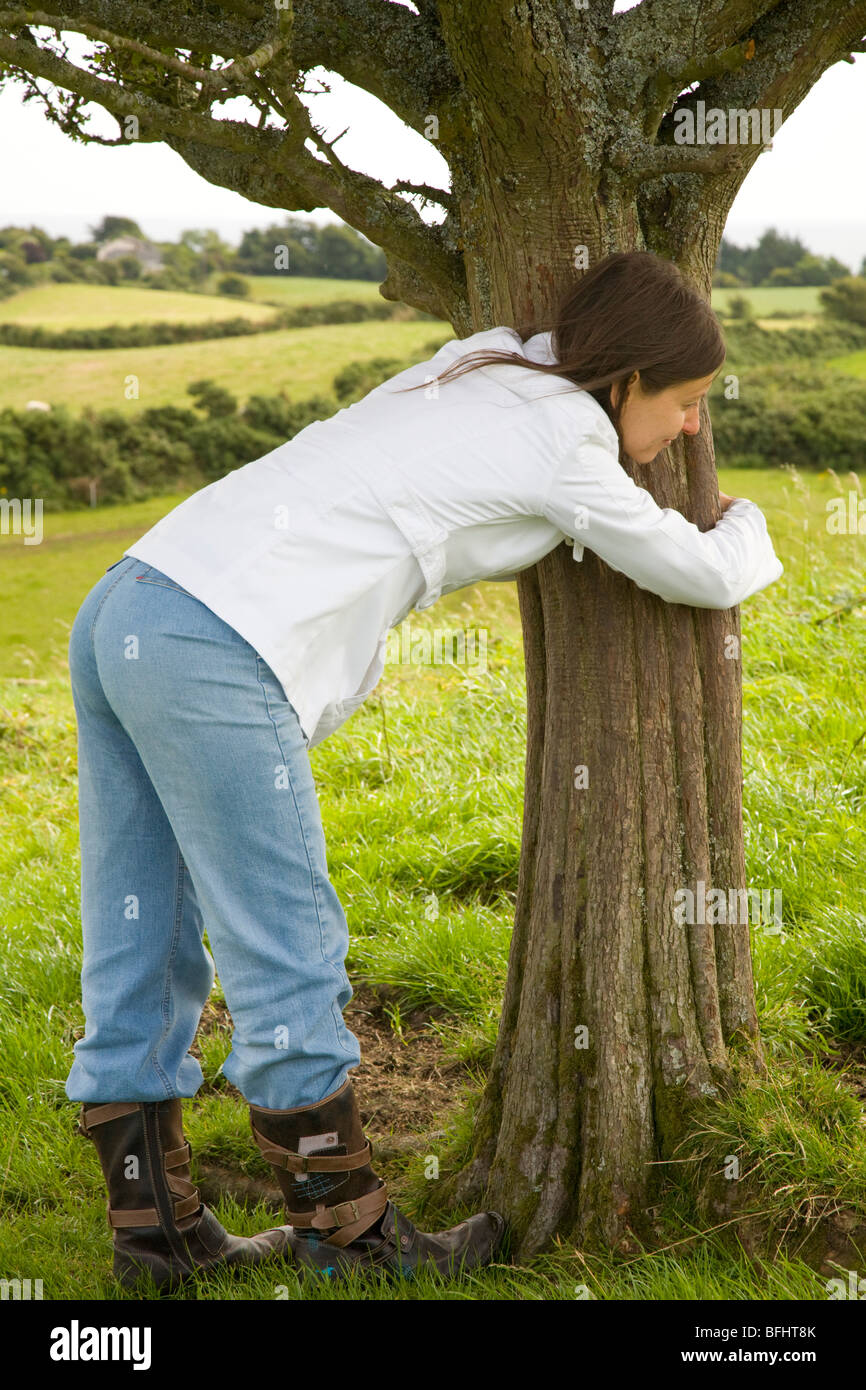 Girl hugging a fairy tree in County Wexford, Ireland Stock Photo - Alamy