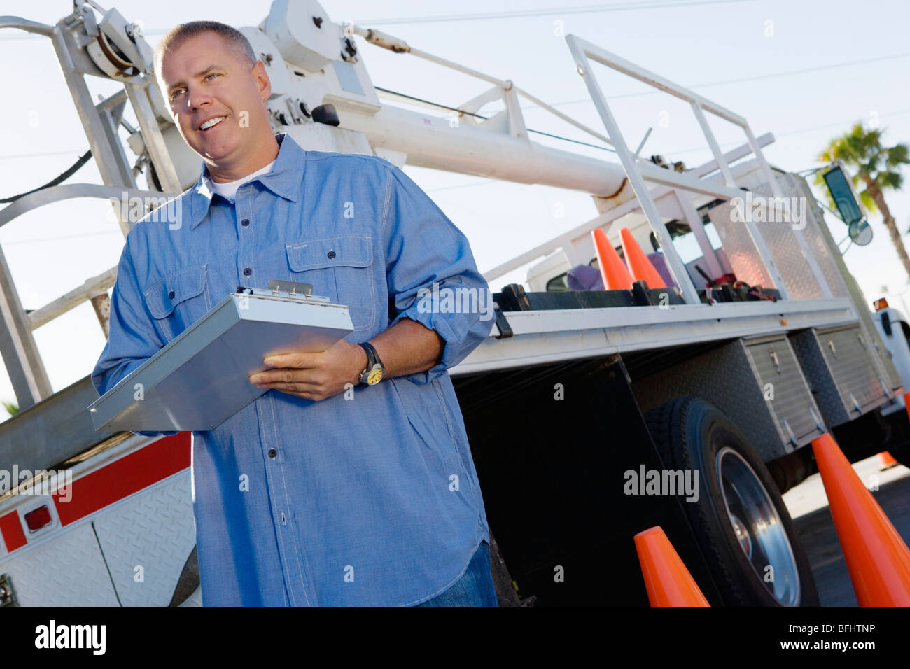 Mid-adult mechanic at work Stock Photo - Alamy