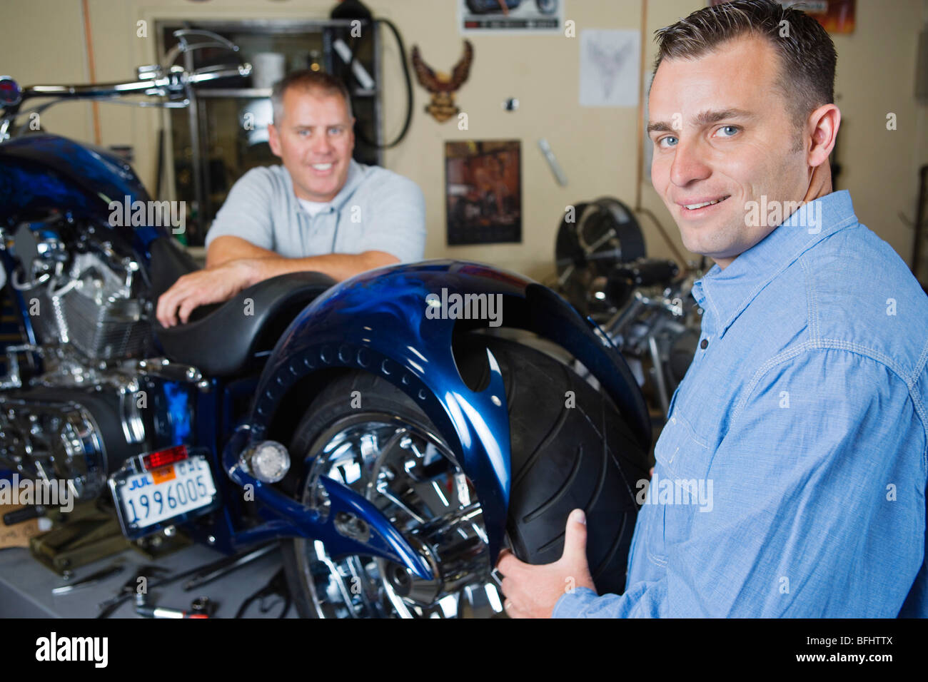 Two mechanics at work Stock Photo - Alamy