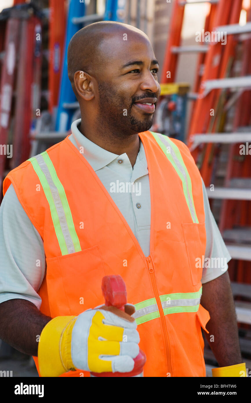 Mid-adult construction worker at work Stock Photo - Alamy