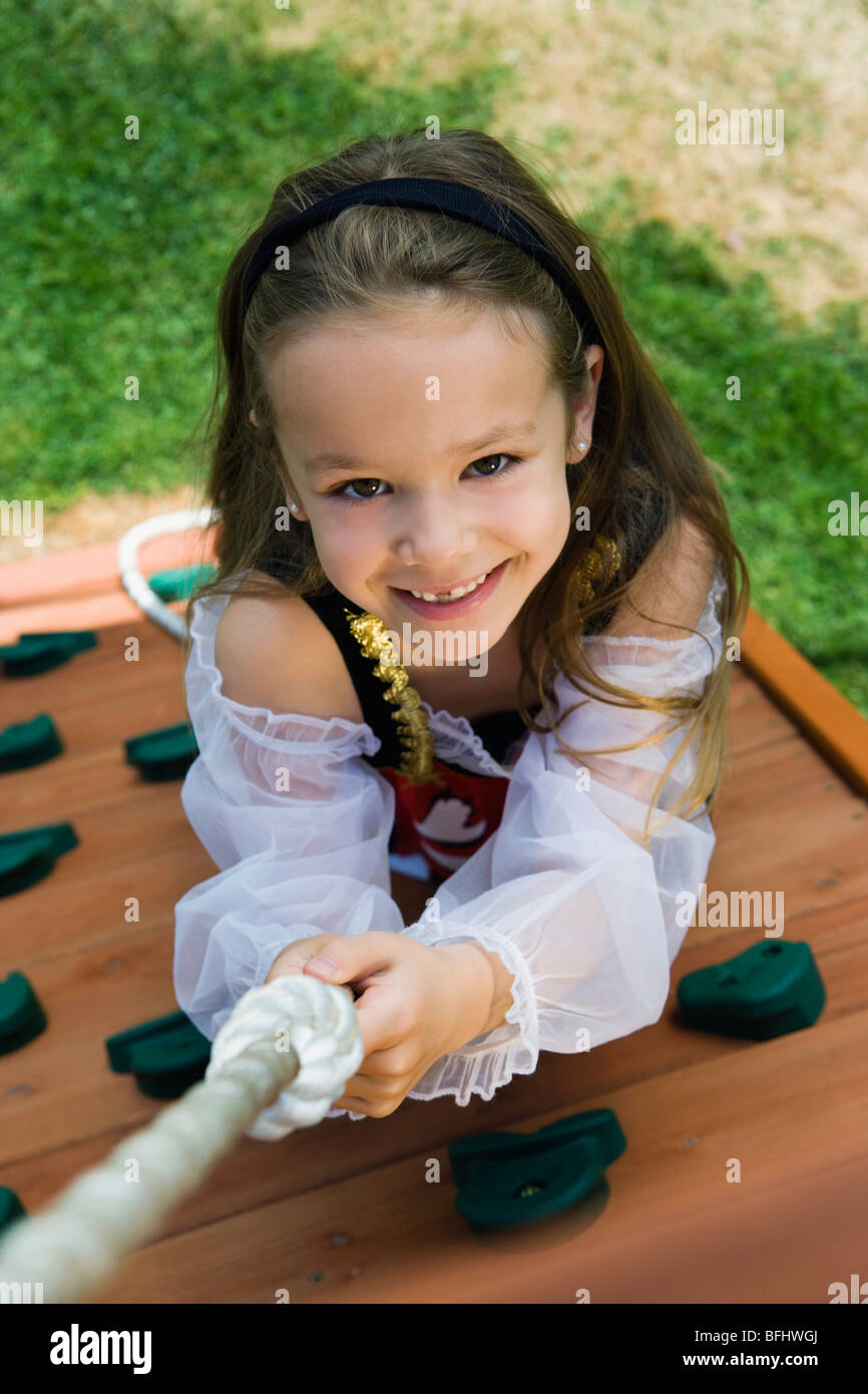 Little Girl Climbing a Rope Stock Photo - Alamy