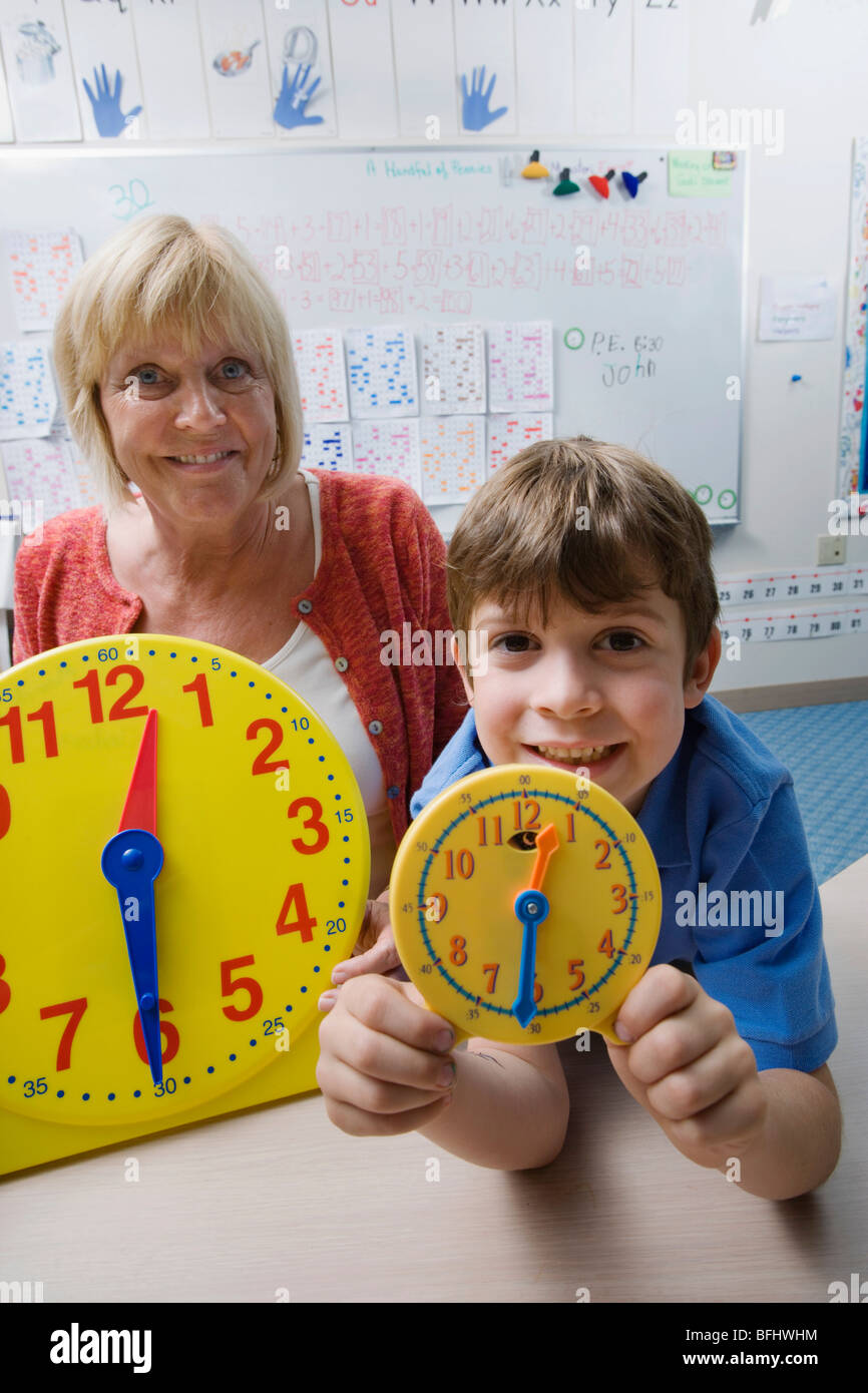 Little Boy Learning to Tell Time Stock Photo - Alamy