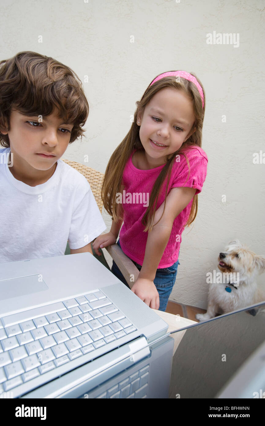 Little Kids Using a Laptop Stock Photo - Alamy