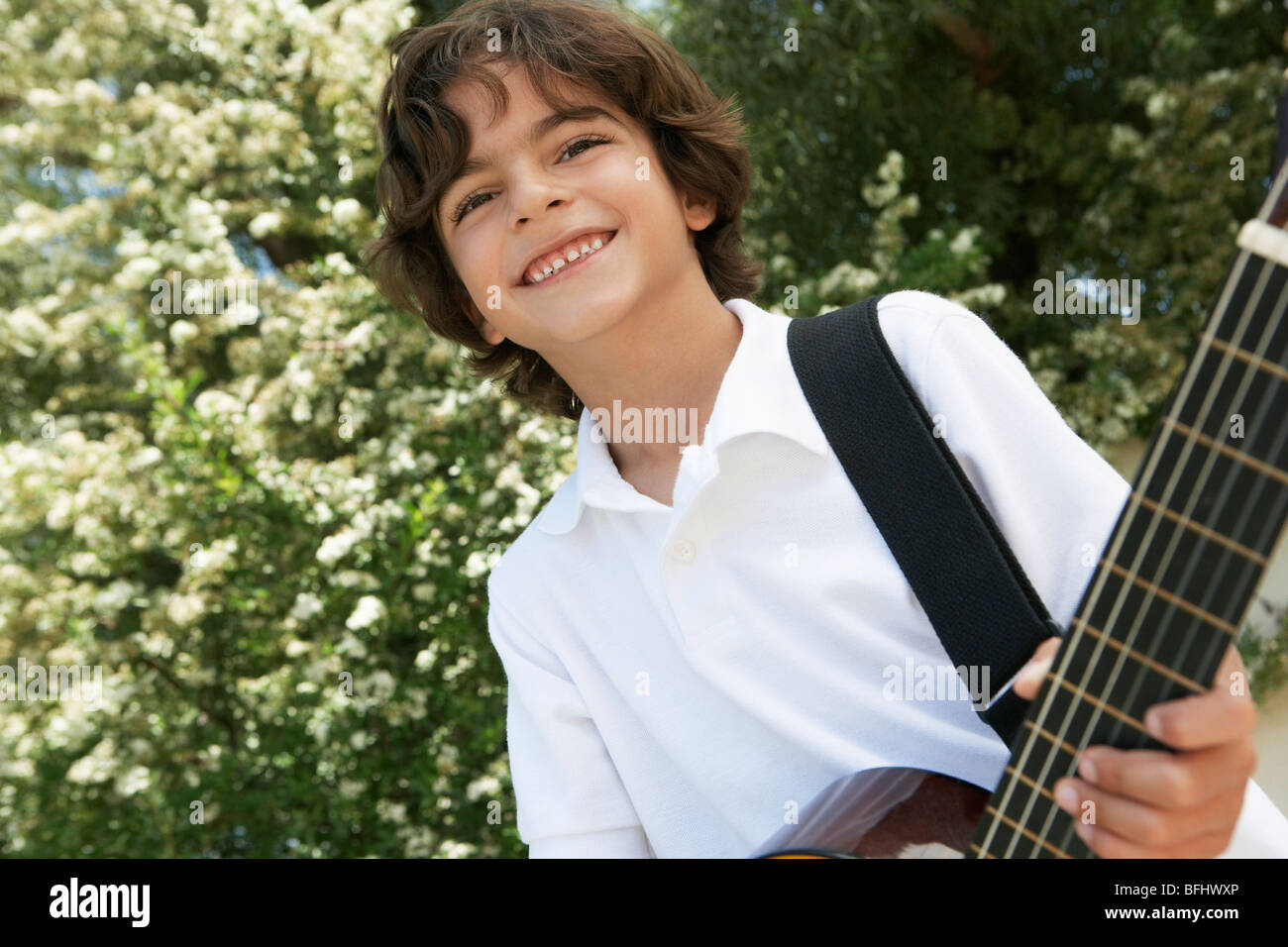 Little Boy Playing Guitar Stock Photo - Alamy