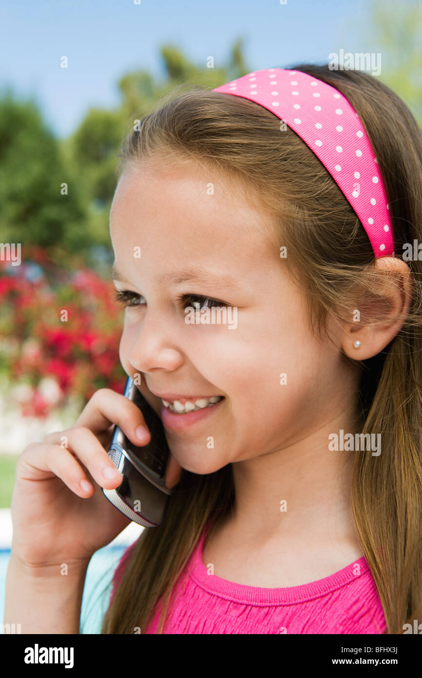 Young Girl Using Cell Phone Stock Photo - Alamy