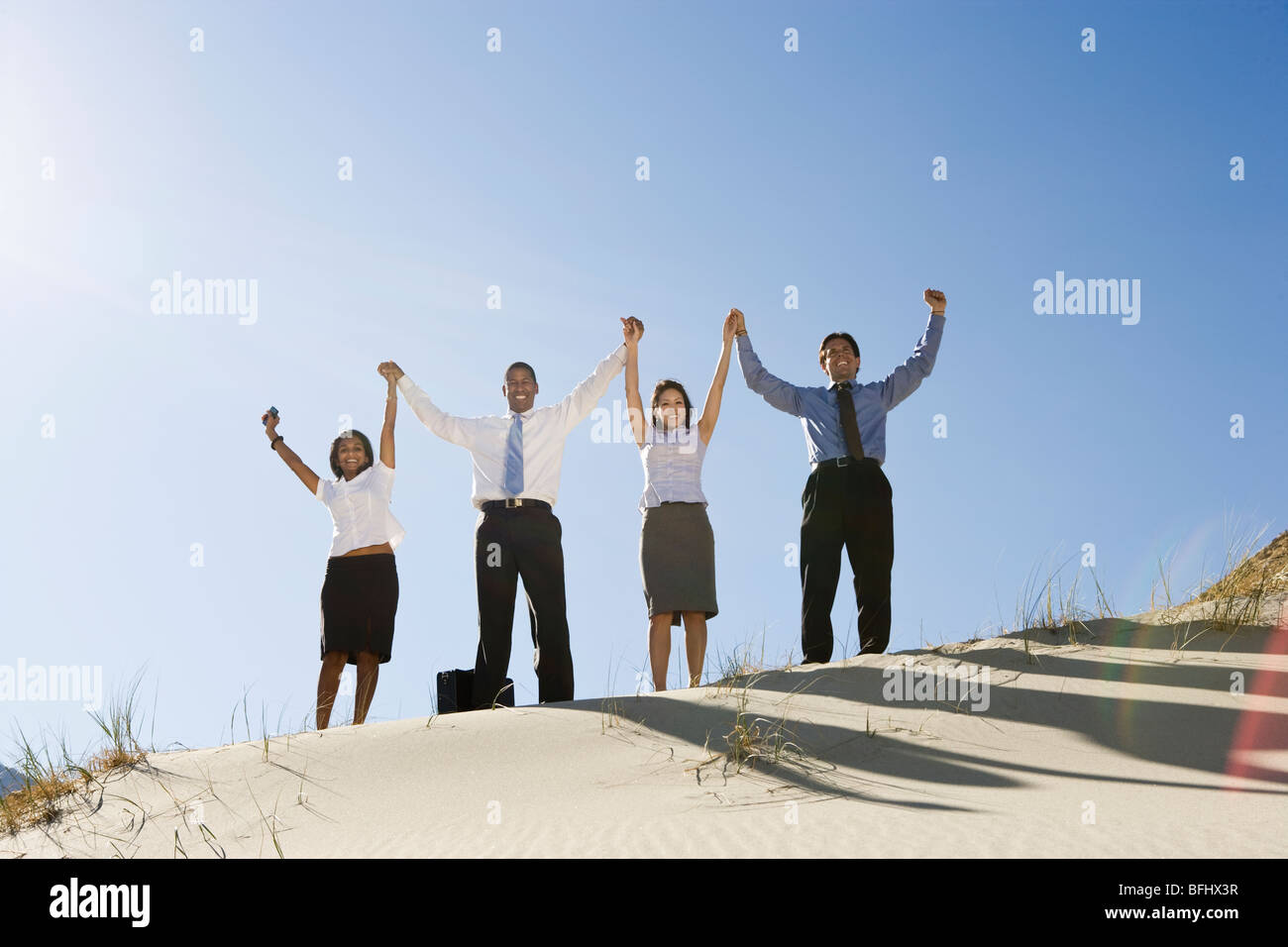 Three businessmen cheering hi-res stock photography and images - Alamy