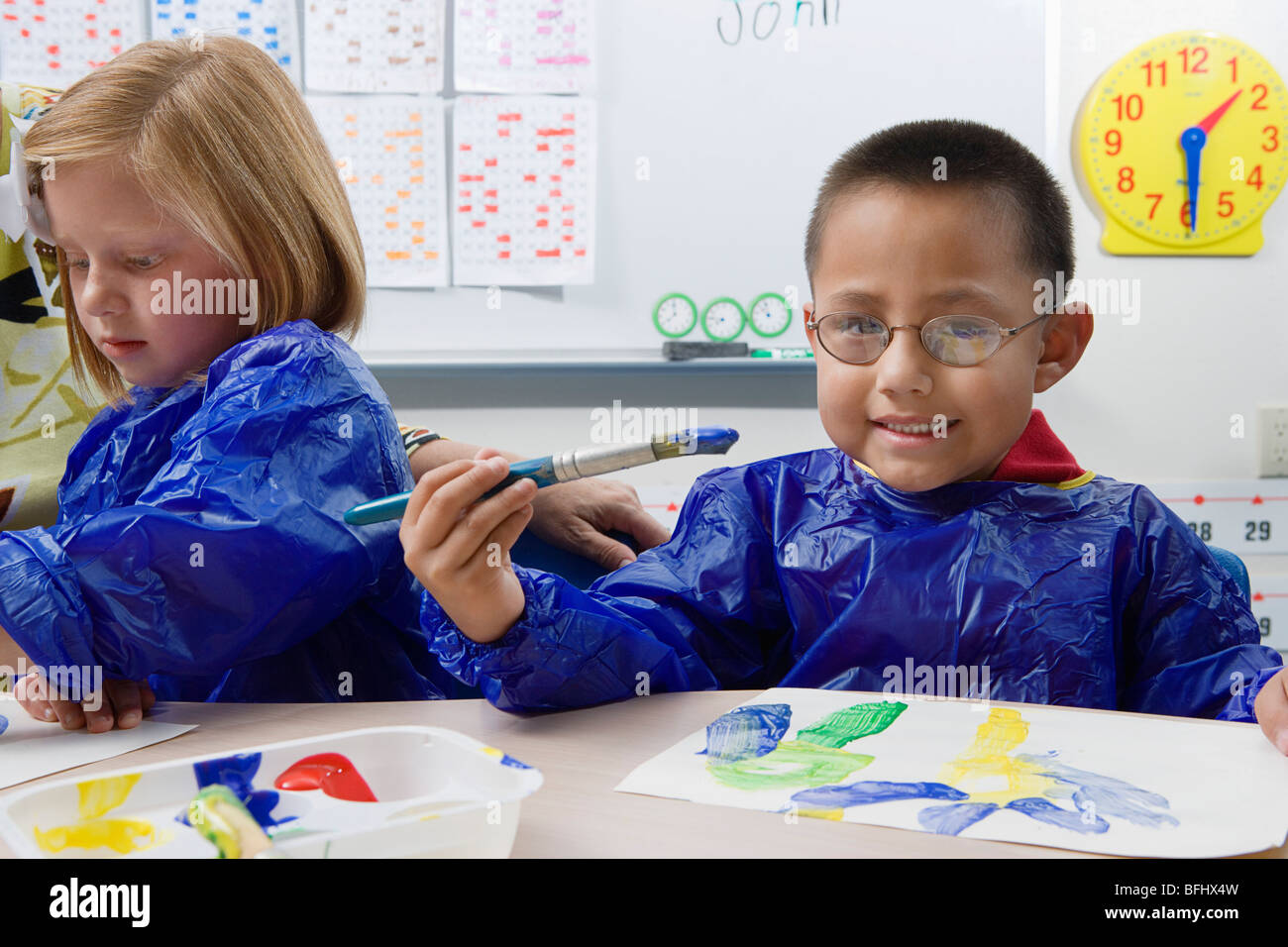 Elementary Students Painting Stock Photo - Alamy