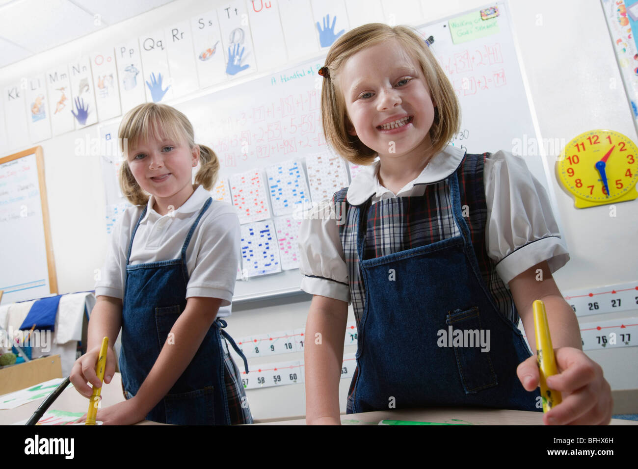 Elementary Students Painting During Art Class Stock Photo - Alamy
