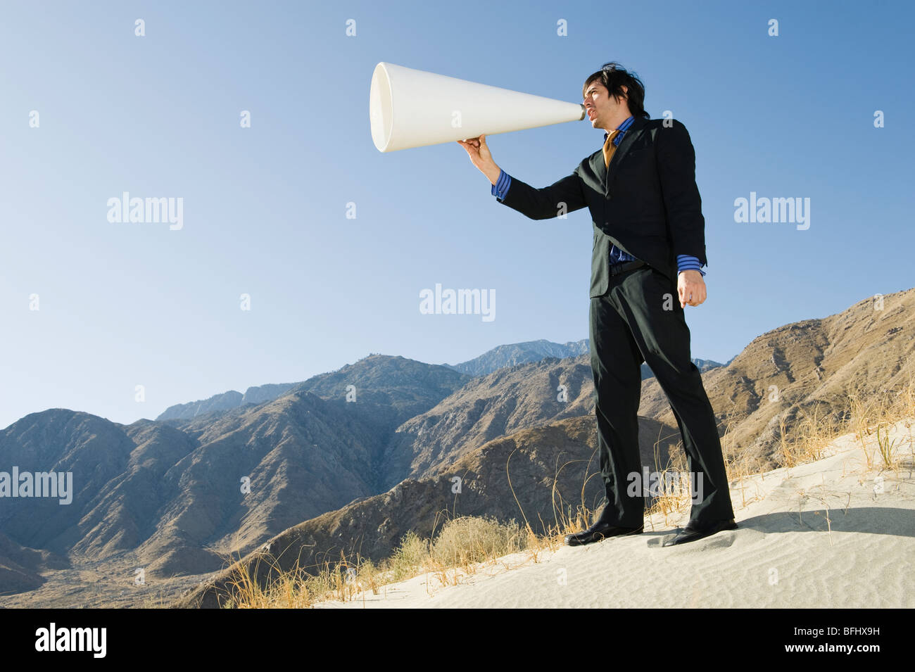 Man megaphone outside hi-res stock photography and images - Alamy