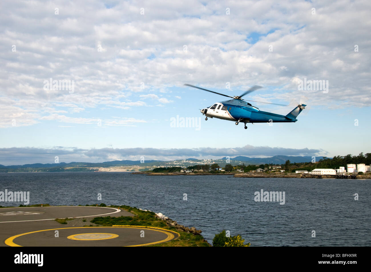 helicopter in flight landing at helipad in Victoria BC Stock Photo - Alamy