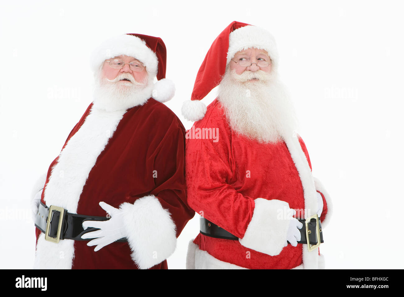 Two men dressed as Santa Claus Stock Photo - Alamy