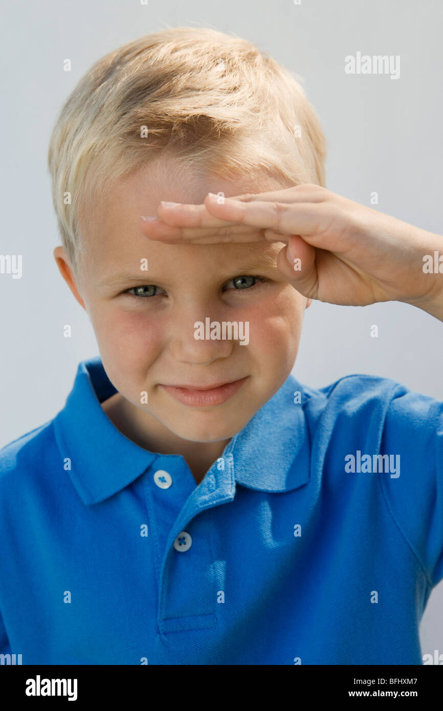 Young Boy Saluting Stock Photo - Alamy