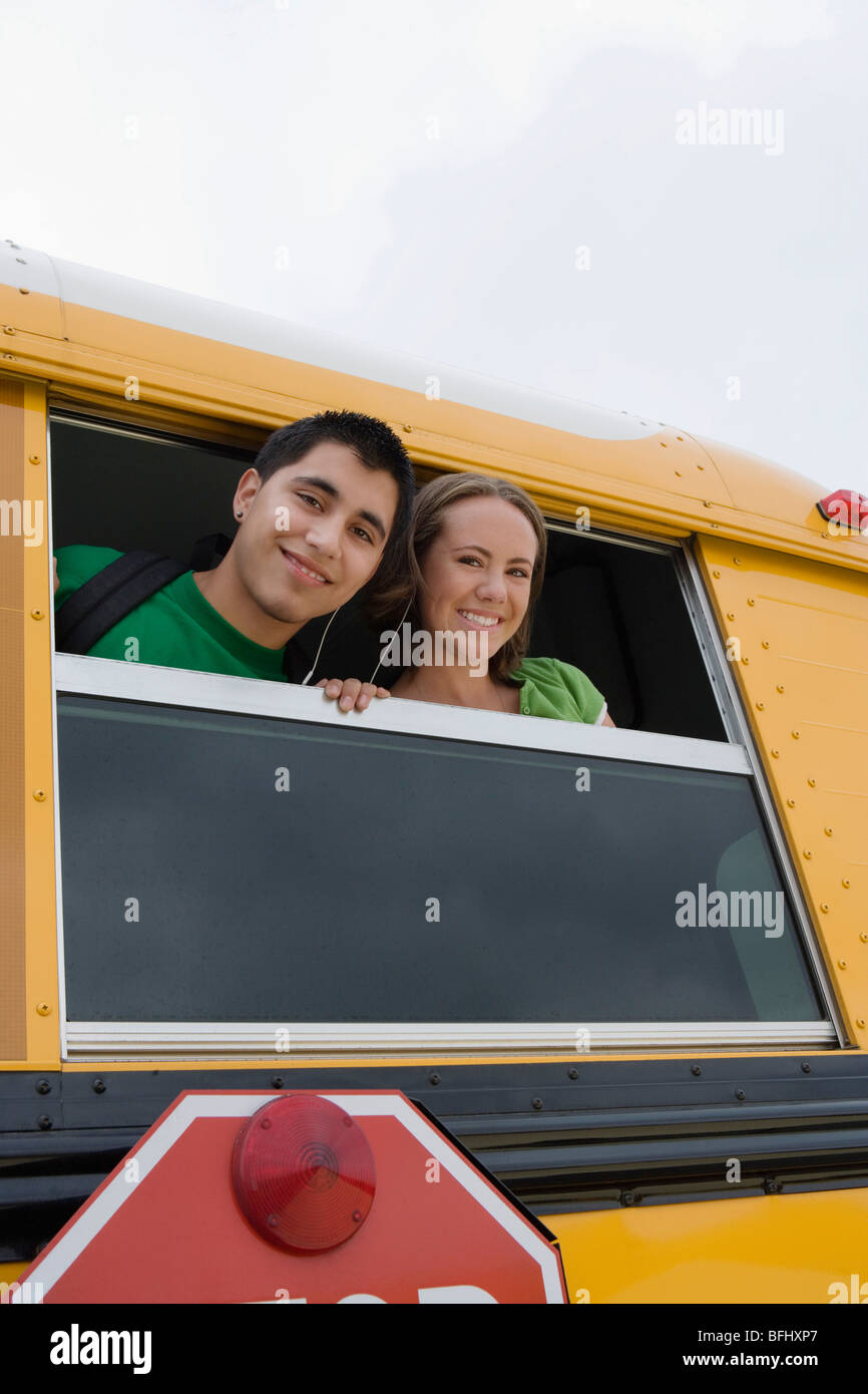 Teen boy and girl school bus hi-res stock photography and images - Alamy
