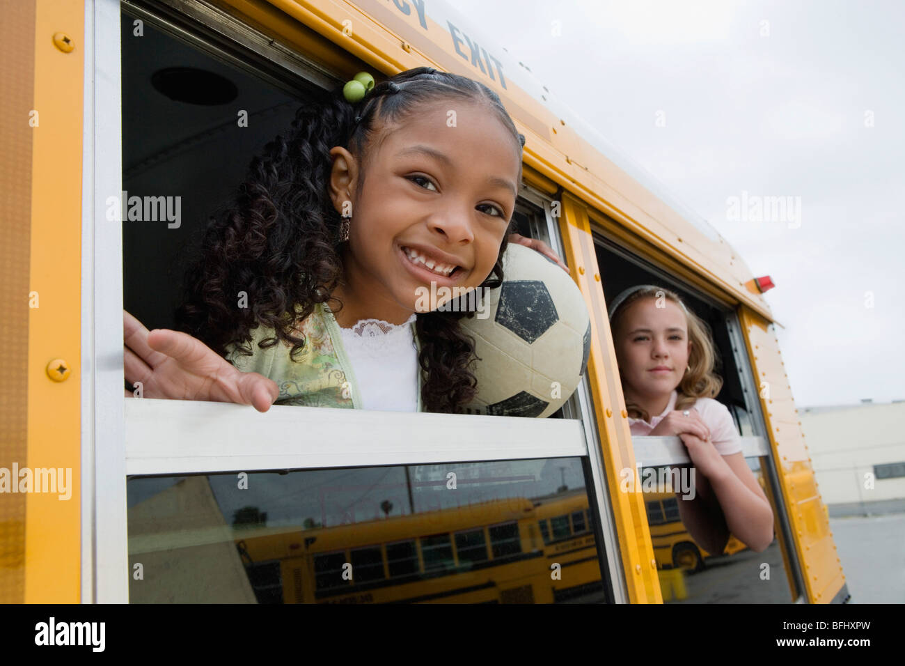 Elementary Students on School Bus Stock Photo - Alamy