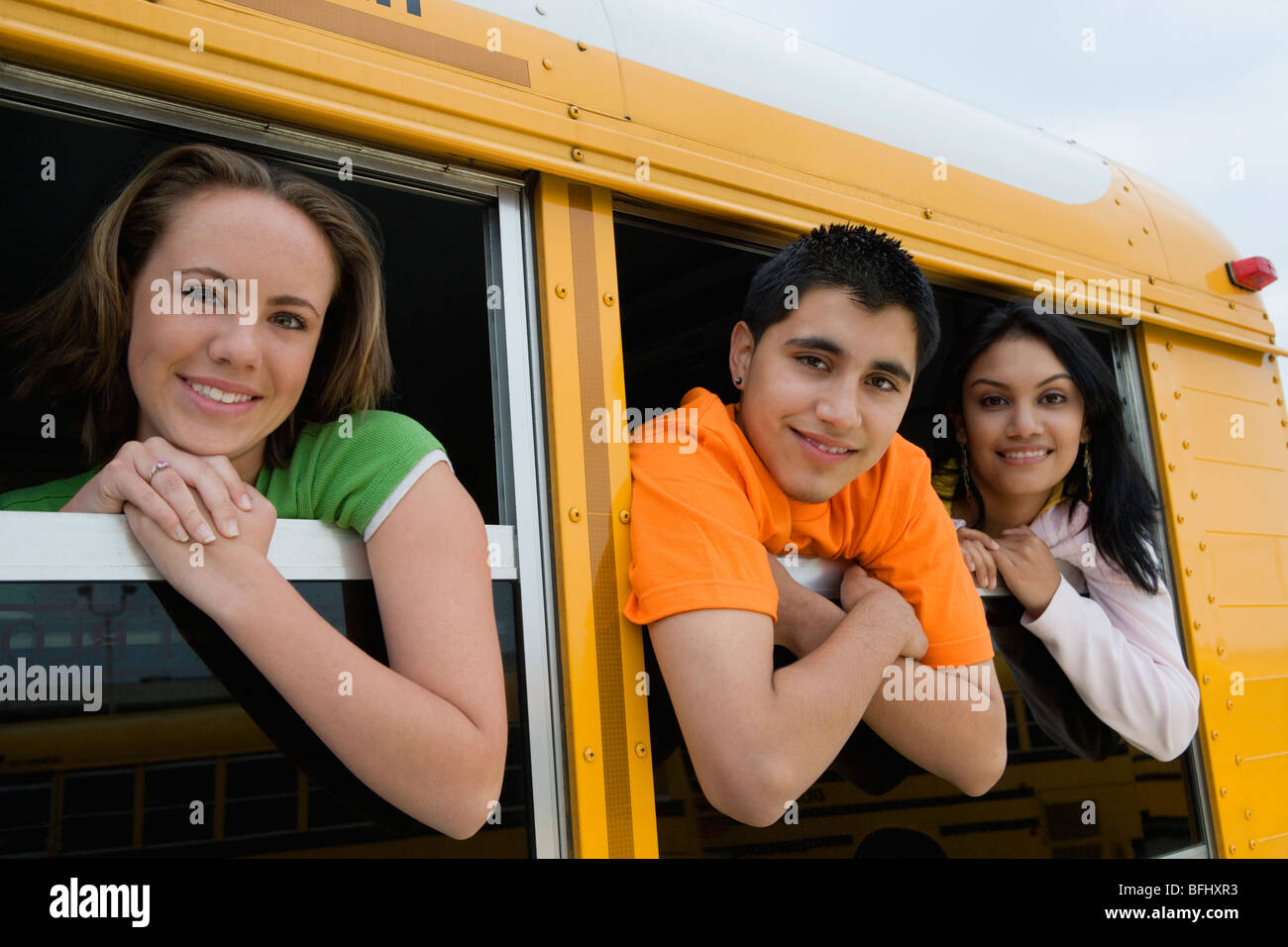 Teen boy and girl school bus hi-res stock photography and images - Alamy
