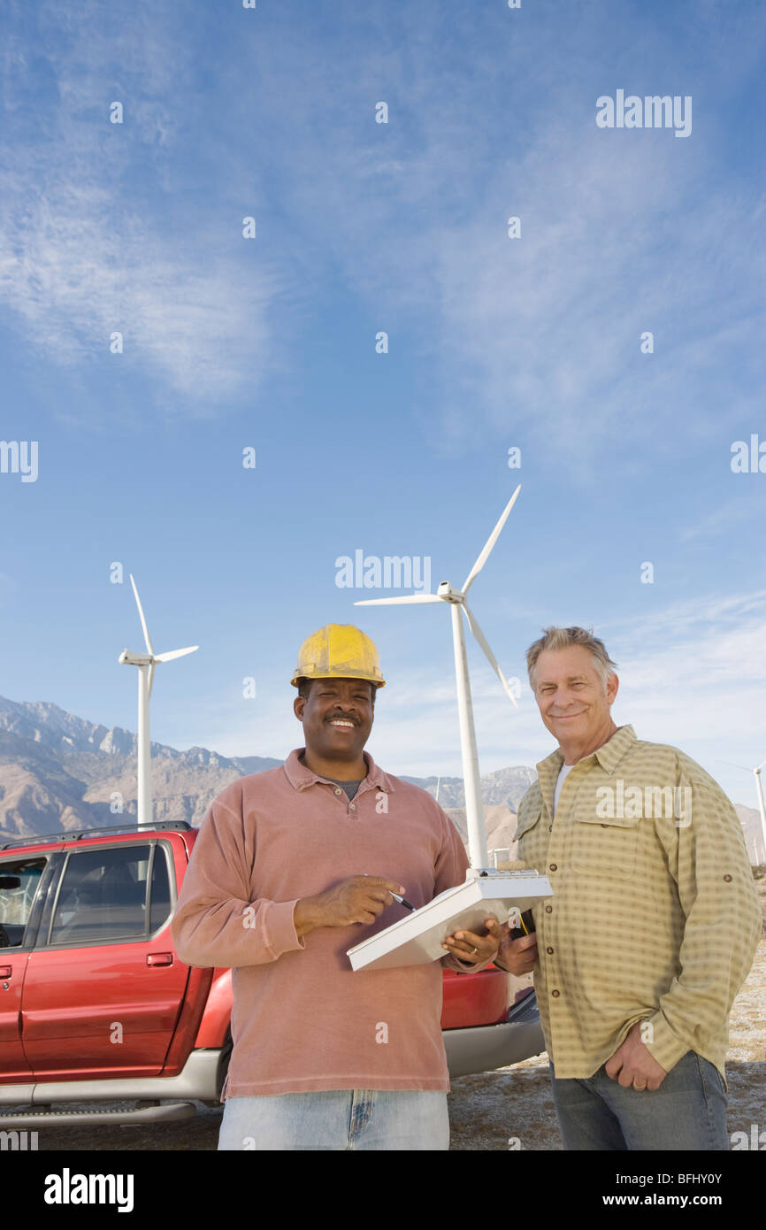 Men working at wind farm Stock Photo - Alamy