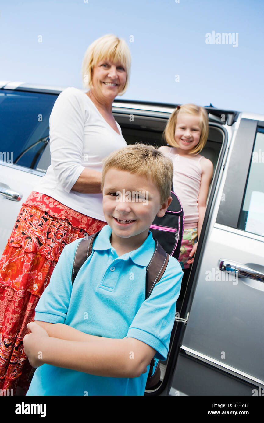 Mother Driving Children to School Stock Photo - Alamy